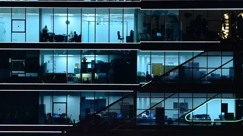 Closeup of office block with people work... | Stock Video | Pond5