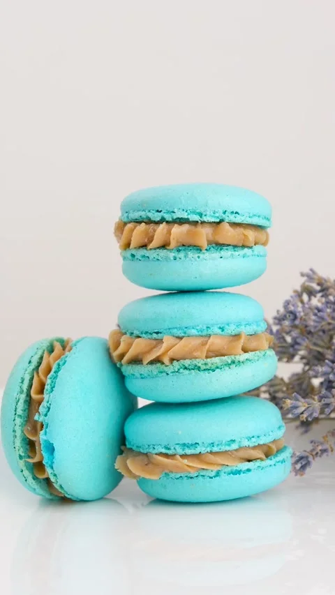 Closeup pan of lavender purple macarons ... | Stock Video | Pond5