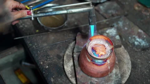 Closeup of a person shaping a copper vas... | Stock Video | Pond5