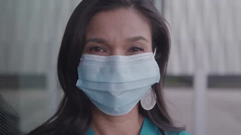 Closeup Portrait of a Masked Nurse Outsi... | Stock Video | Pond5