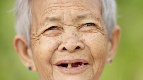 Closeup Portrait of a Toothless Old Asia... | Stock Video | Pond5