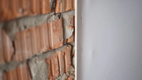 Closeup of red brick wall with grey conc... | Stock Video | Pond5
