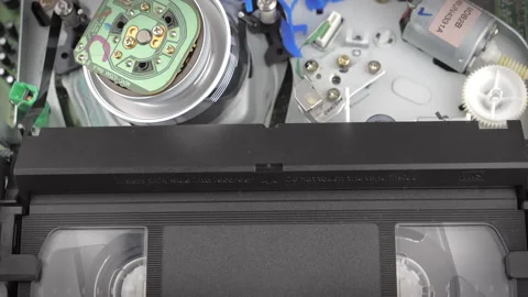 Closeup shot showing inside a vcr while ... | Stock Video | Pond5