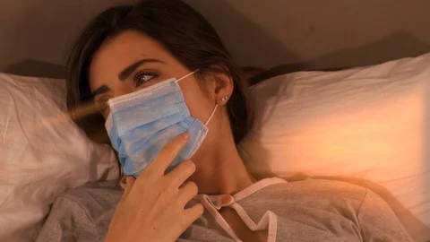 Closeup of sick woman with coronavirus w... | Stock Video | Pond5