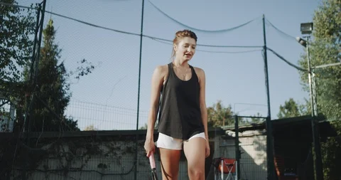 Closeup a sportiv woman beat the ball wi... | Stock Video | Pond5