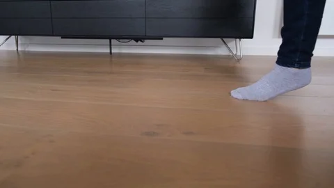 Closeup of woman feet creeping on wooden... | Stock Video | Pond5