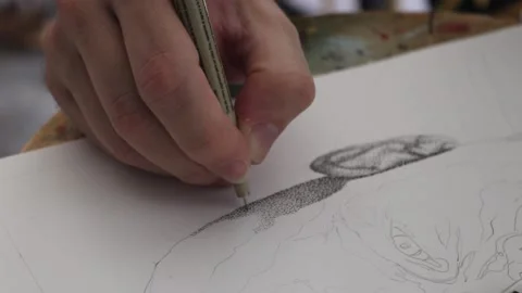 Closeup of a young white man drawing a b... | Stock Video | Pond5