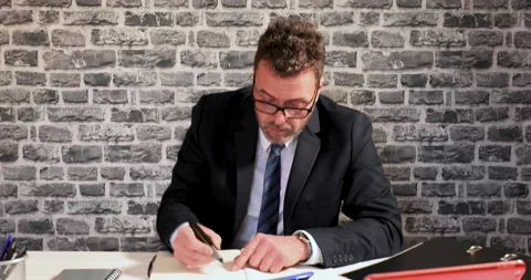 Closing in on business man writing list ... | Stock Video | Pond5
