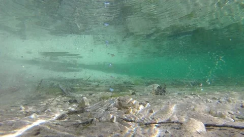 Cloud of sand particles slowly float in ... | Stock Video | Pond5