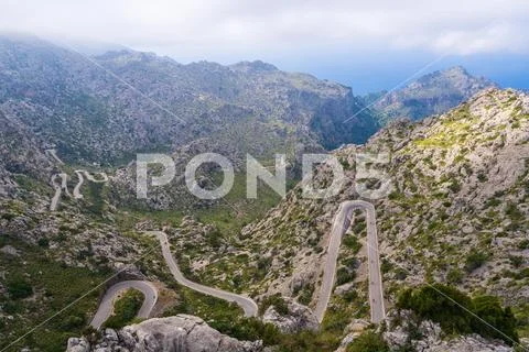 Clouds on the famous winding road in Sa Calobra on the island of ...