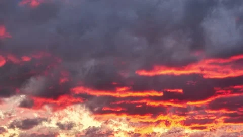 The clouds move fast at dusk. Windy clou... | Stock Video | Pond5