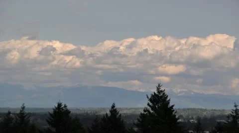 Clouds Moving Forward under a blue sky w... | Stock Video | Pond5