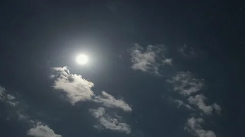 Clouds passing by moon at night. Full mo... | Stock Video | Pond5