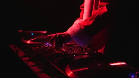 Club disc jockey in red Santa costume pl... | Stock Video | Pond5