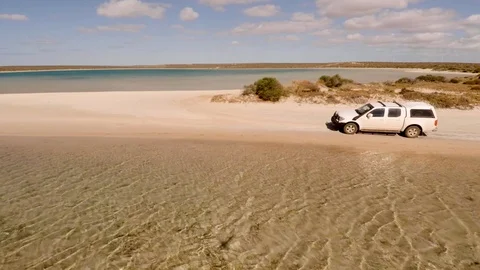 Coast and sea shot with a ute on lands | Stock Video | Pond5