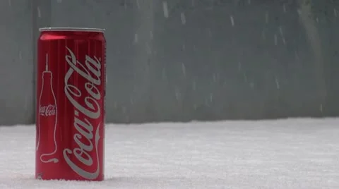 Coca Cola can on snow | Stock Video | Pond5