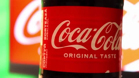 Coca cola original taste on the backgrou... | Stock Video | Pond5