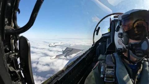 Cockpit footage of U.S. Navy pilot firin... | Stock Video | Pond5