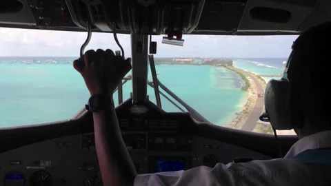 Cockpit view of pilot landing a seaplane... | Stock Video | Pond5