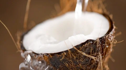 Coconut pouring water, dripping coconut ... | Stock Video | Pond5