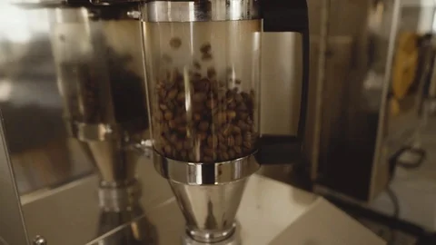 Coffee beans bouncing inside the glass b... | Stock Video | Pond5