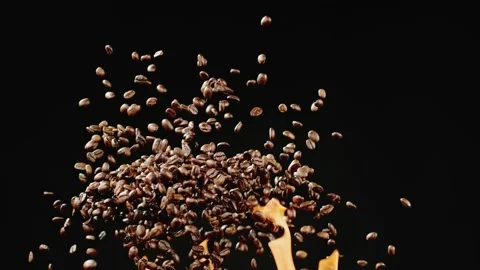 Coffee Beans Fly In The Air Above A Flam... | Stock Video | Pond5