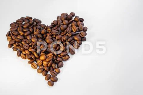 Coffee beans heart isolated on white background. Coffee beans in shape ...
