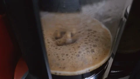Coffee Brewing in Glass Container | Stock Video | Pond5