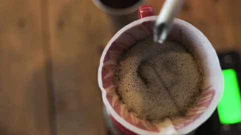 Coffee drip process by pouring hot water... | Stock Video | Pond5