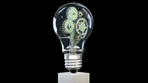 Cogs rotating inside of a light bulb, se... | Stock Video | Pond5
