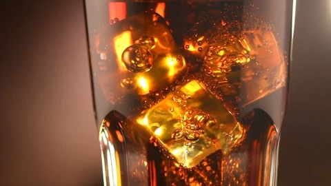 Coke with ice cubes closeup. Glass of fi... | Stock Video | Pond5