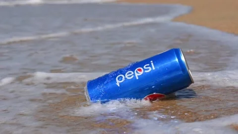 A cold can of Pepsi soft drink on the se... | Stock Video | Pond5