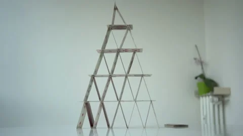 Collapsing house of cards. | Stock Video | Pond5