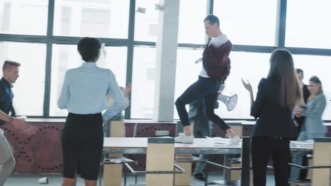Colleagues dancing on the table, singing... | Stock Video | Pond5