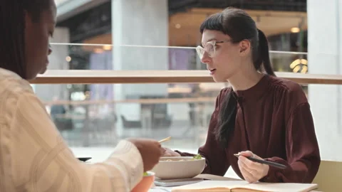 Colleagues Discussing Work during Lunch ... | Stock Video | Pond5