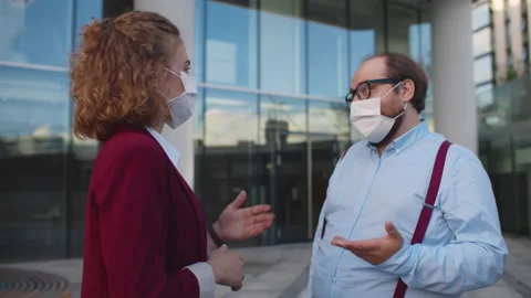 Colleagues wear face mask greeting with ... | Stock Video | Pond5