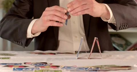 Collecting puzzle cards table with the h... | Stock Video | Pond5