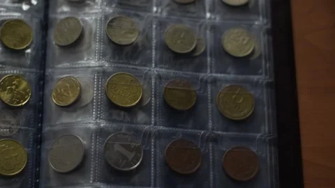 Collection of coins from around the worl... | Stock Video | Pond5