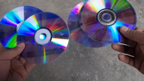 A collection of DVD discs shown by someo... | Stock Video | Pond5