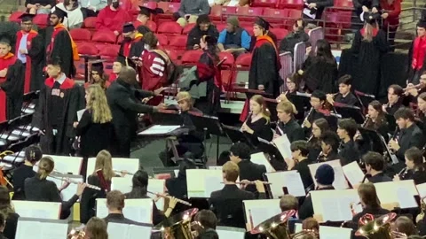 College Graduation - Band Conductor with... | Stock Video | Pond5