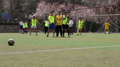 college students playing football on fie... | Stock Video | Pond5