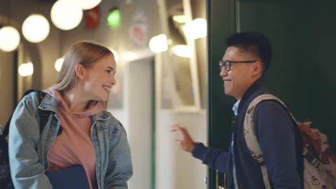 College students walk out of classroom a... | Stock Video | Pond5