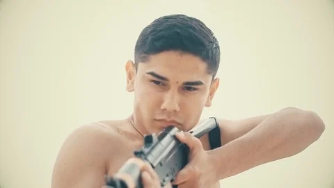 Colombian gangster holds a firearm in hi... | Stock Video | Pond5