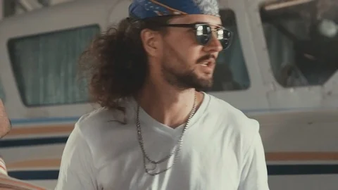 Colombian gangster in a white shirt in t... | Stock Video | Pond5