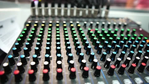 Color-coded knobs on a digital soundboar... | Stock Video | Pond5