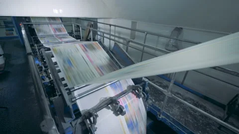 Colored newspaper pages printed in a typ... | Stock Video | Pond5