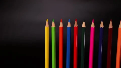 Colored pencils on black background in H... | Stock Video | Pond5
