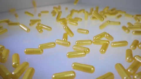 Colorful capsules of the medication is f... | Stock Video | Pond5