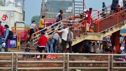 colorful crowd of people decending the s... | Stock Video | Pond5