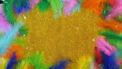 Colorful feathers falling on the snow by... | Stock Video | Pond5
